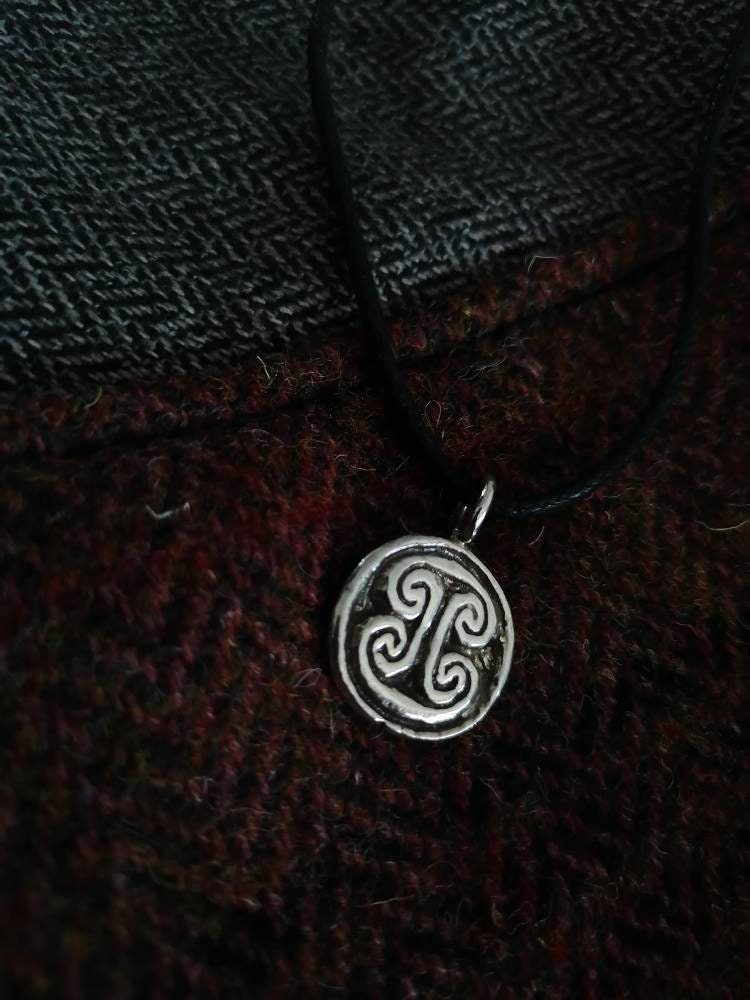 Skinnet Pictish stone symbol in sterling silver. – Caledonian Forge
